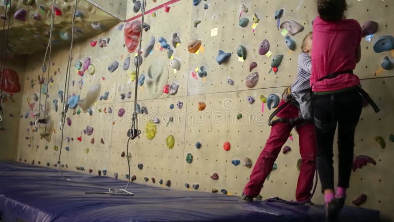 Two Girls Pulling a Safety Rope Next To the Stock Video - Video of ...