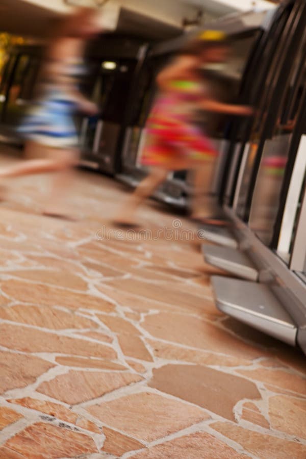 Two girls running stock photo. Image of moving, station - 12208588