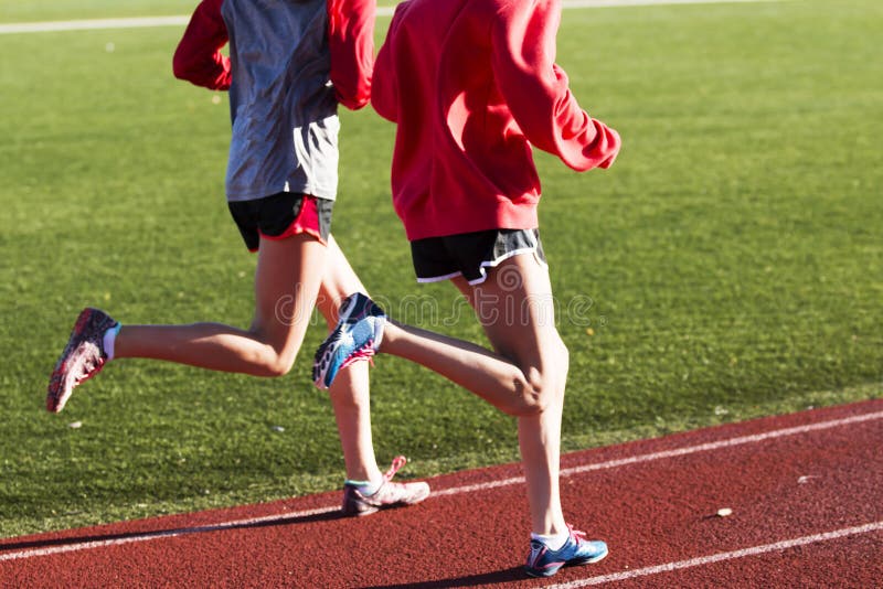 Two Girls Running Fast on a Track Stock Image - Image of girls, racing ...