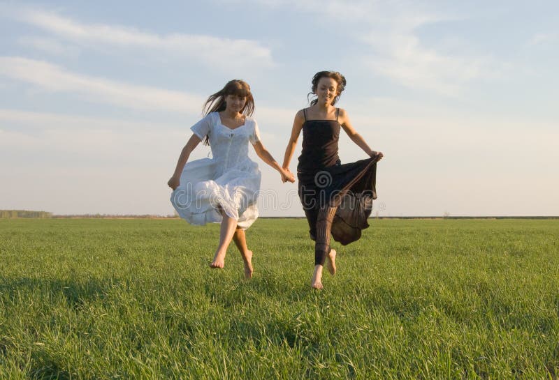 Two Girls Running On The Field 4 Royalty Free Stock Image - Image: 6835836