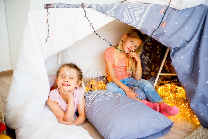 Two girls at a sleepover stock photo. Image of couch - 96607618