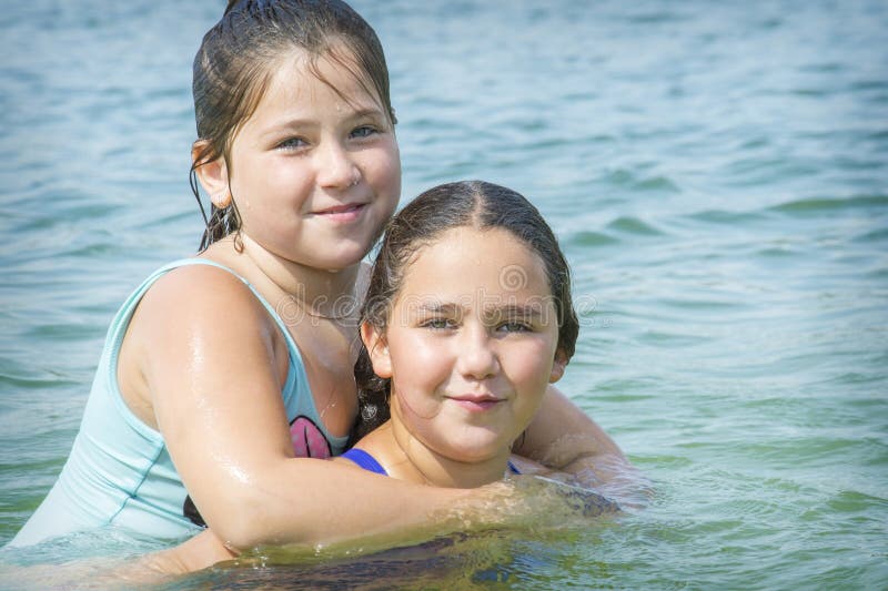 Two Girls Swim in the River in Summer Stock Image - Image of happy ...