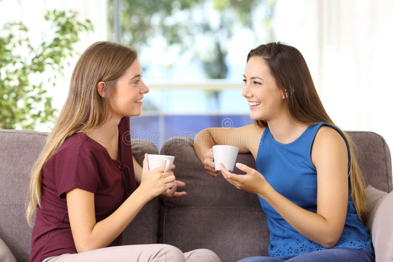 Two Girls Talking and Drinking at Home Stock Photo - Image of casual ...