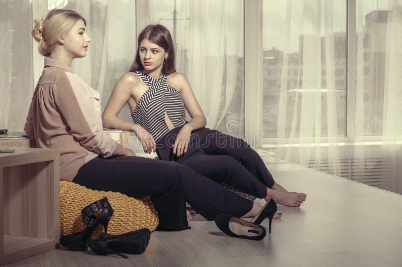 Two Girls Talking in an Informal Atmosphere Stock Photo - Image of ...