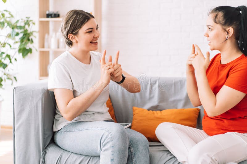 Two Girls Talking in Sign Language Stock Image - Image of manager ...