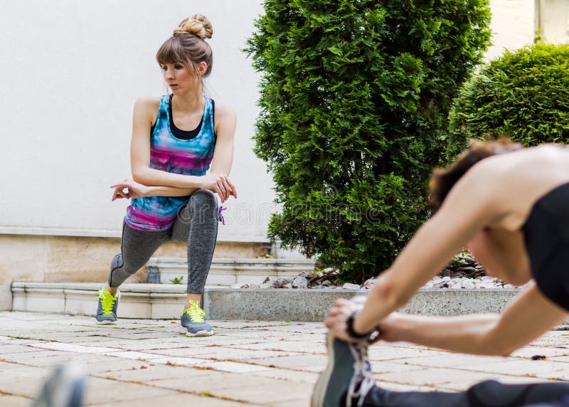 Two girls training stock photo. Image of outdoors, happiness - 92917354