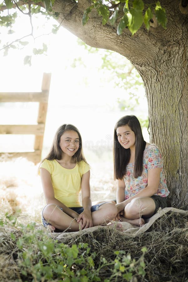 Two Tween Girls walking stock photo. Image of nature - 10979288