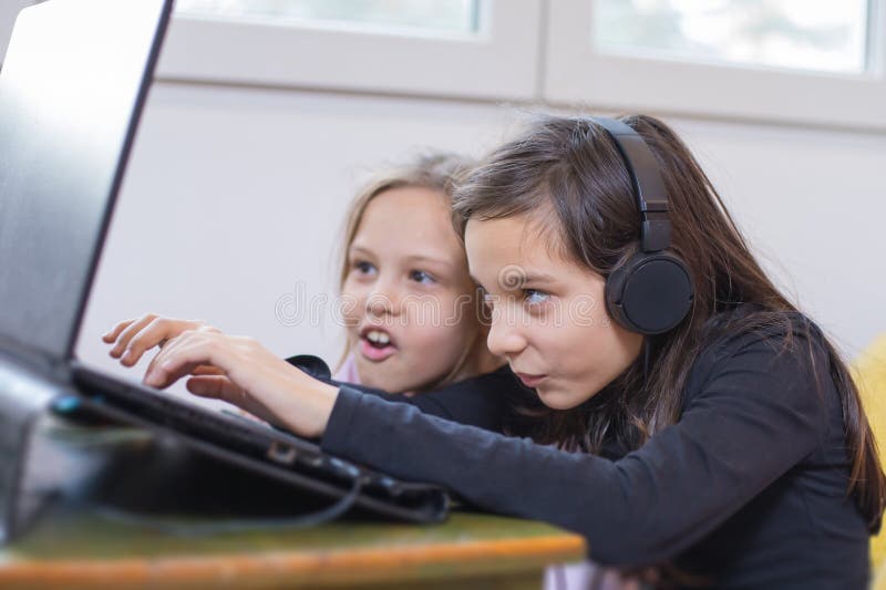 Two Girls Using Computer at Home Stock Image - Image of enjoyment, game ...