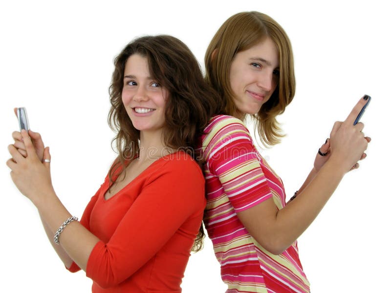 Two Girls Using Mobile Phones Stock Image - Image of message, friends ...