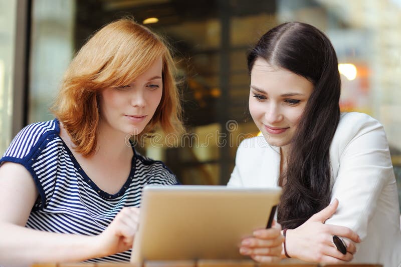 Two Girls Using Tablet Computer Stock Image - Image of look, european ...