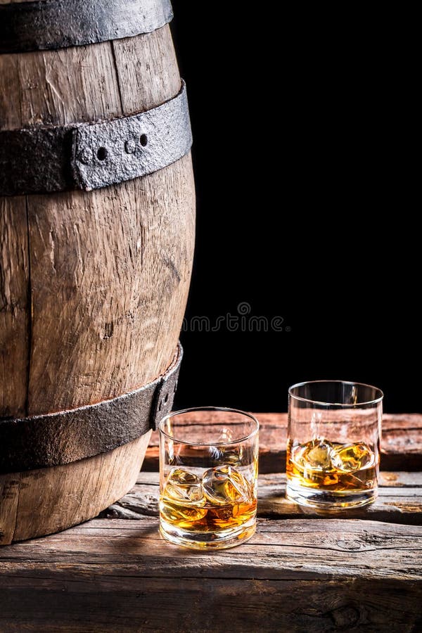 Two glasses of aged Scotch stock photo. Image of liquor - 50316184
