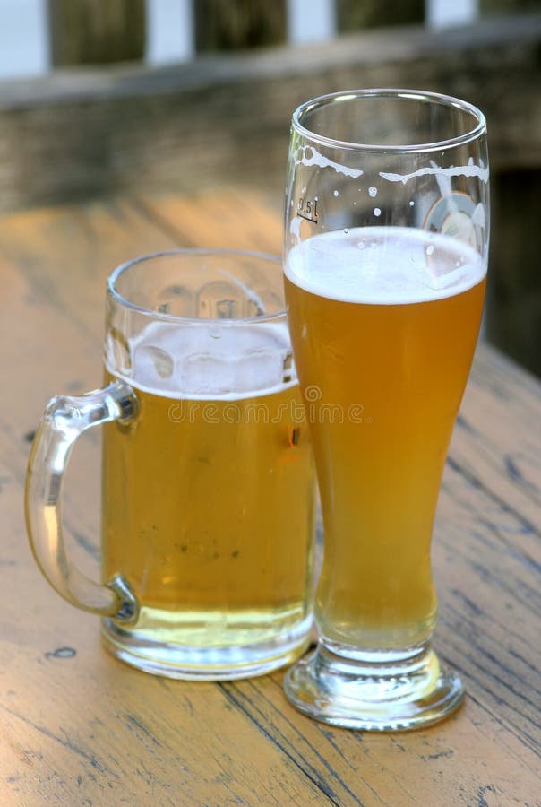 Two glasses of beer stock photo. Image of dish, beer, crown - 930520