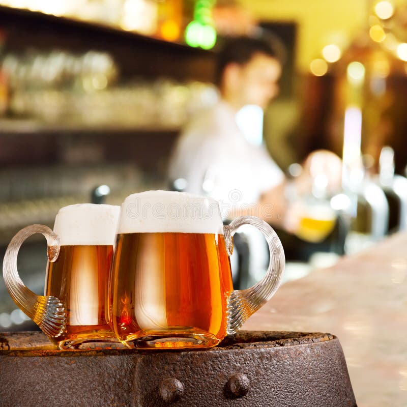 Two Glasses of Beer in the Bar Stock Photo - Image of froth, beer: 74648944