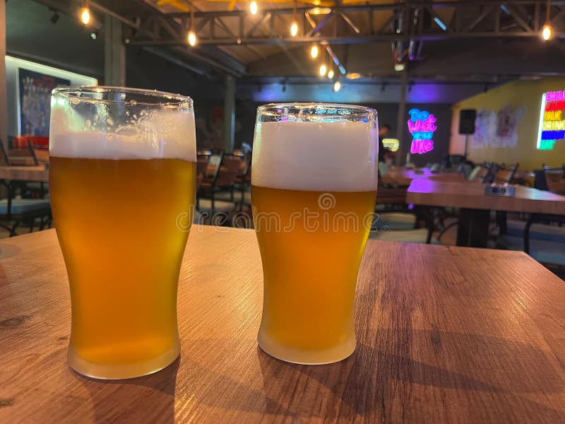 Two Glasses of Beer on the Table in the Pub Stock Photo - Image of ...
