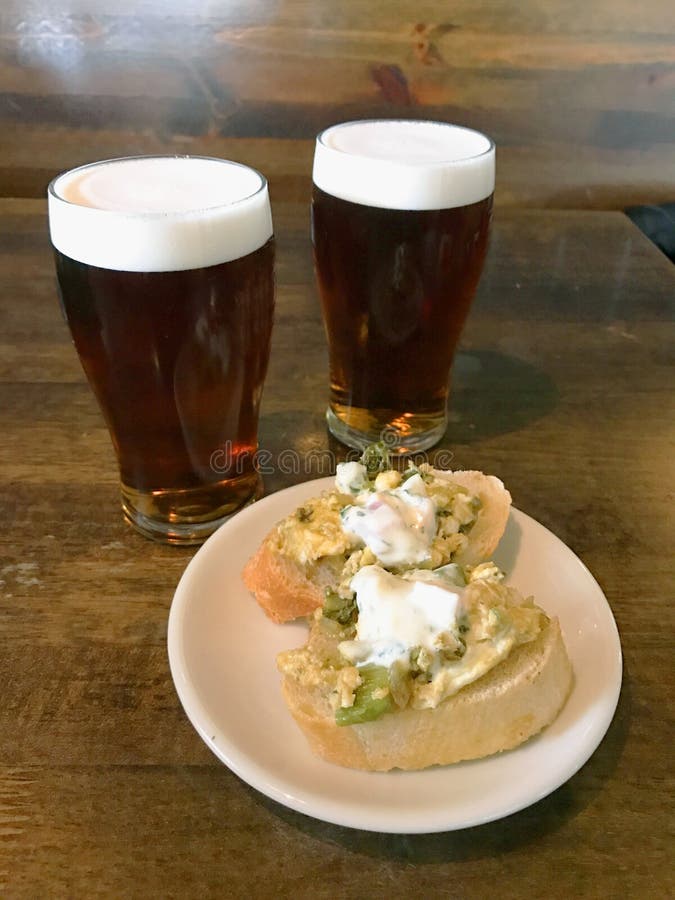 Two Glasses of Beer with Two Tapas Stock Image - Image of eating, drink ...