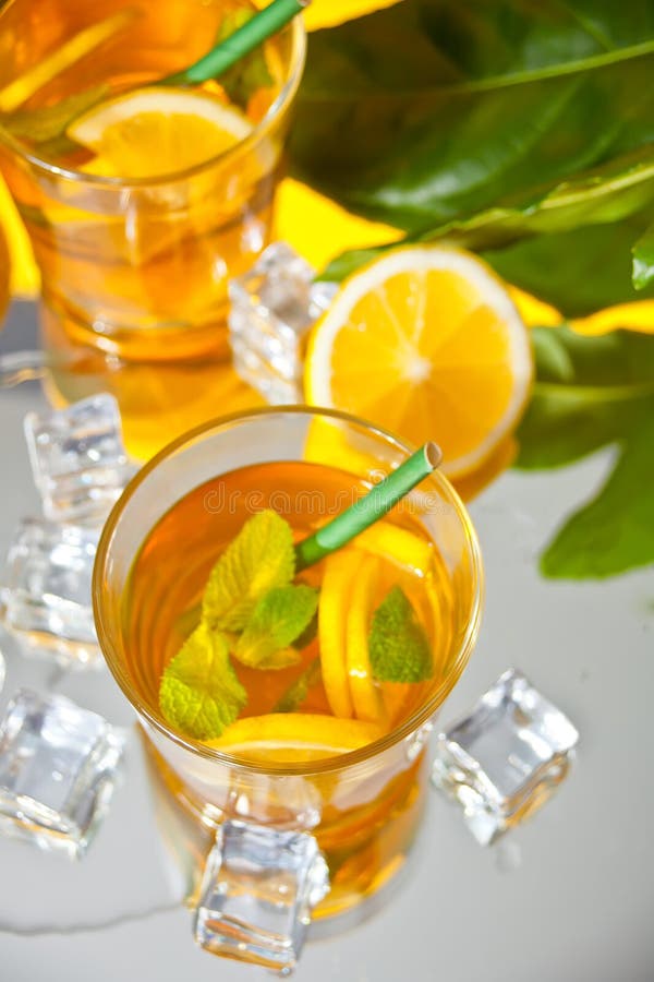 Two Glasses of Cold Refreshment Tea with Ice and Lemon Fruit Stock ...