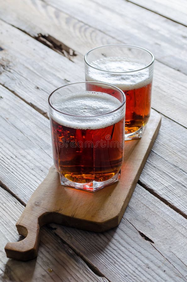 Two Glasses of Dark Amber Beer Stock Image - Image of dark, cold: 68782161