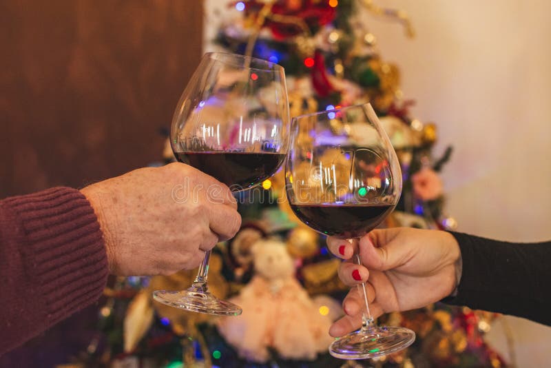 Two glasses making cheers stock image. Image of couple - 205760243