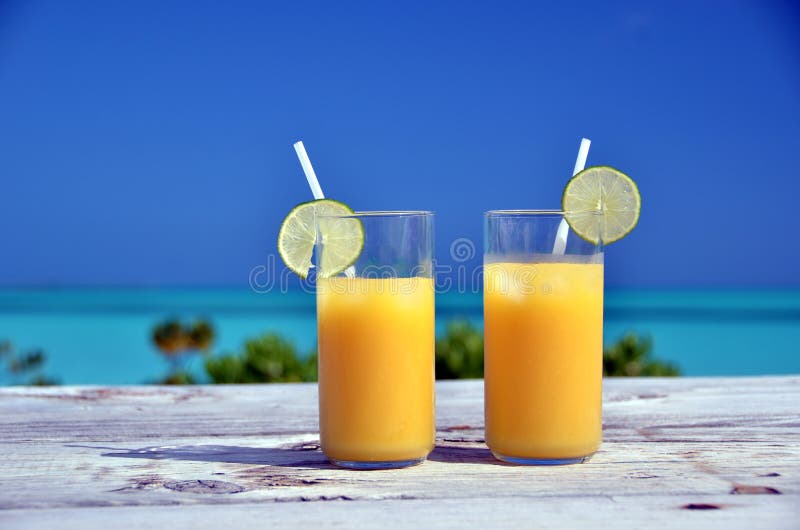 Two Glasses of Orange Juice Stock Photo - Image of bahamas, juicy: 33392250