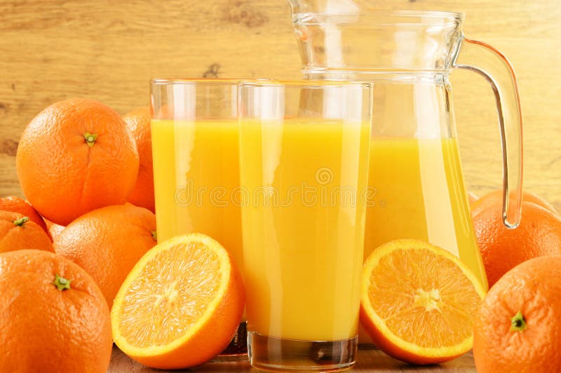 Two Glasses of Orange Juice and Fruits Stock Photo - Image of liquid ...