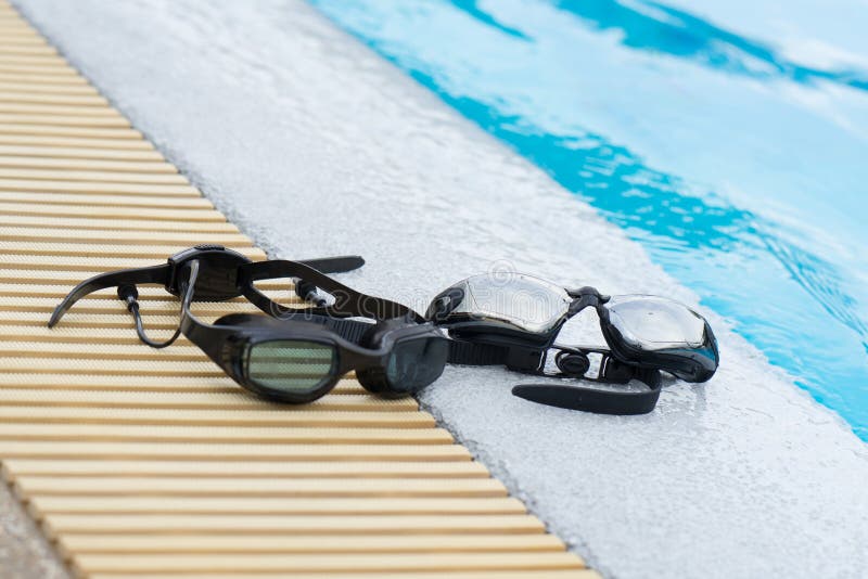 Two Glasses For Swimming Black On Pool Edge Stock Image Image Of Glasses Concept 102866199