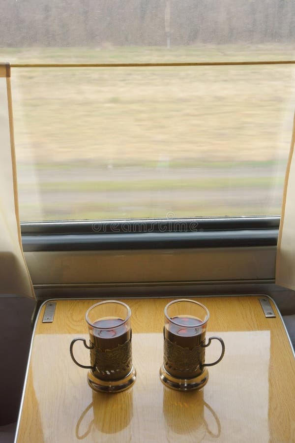 Two Glasses of Tea on the Train Stock Image - Image of tall, liquid ...