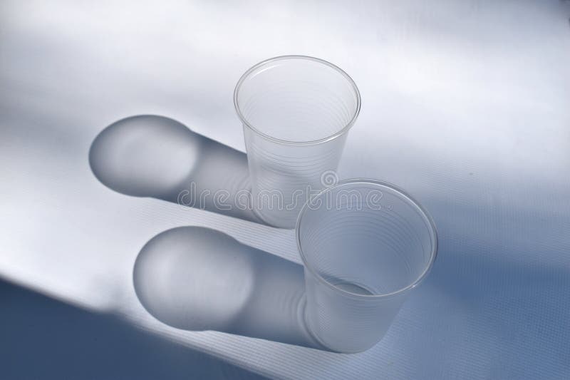 Two Glasses and Their Shadow on the Table. Stock Photo - Image of ...