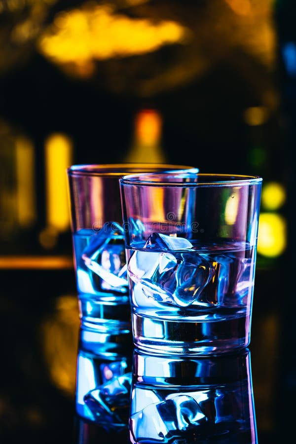 Two Glasses of Vodka with Ice Cubes Stock Photo - Image of cocktail ...