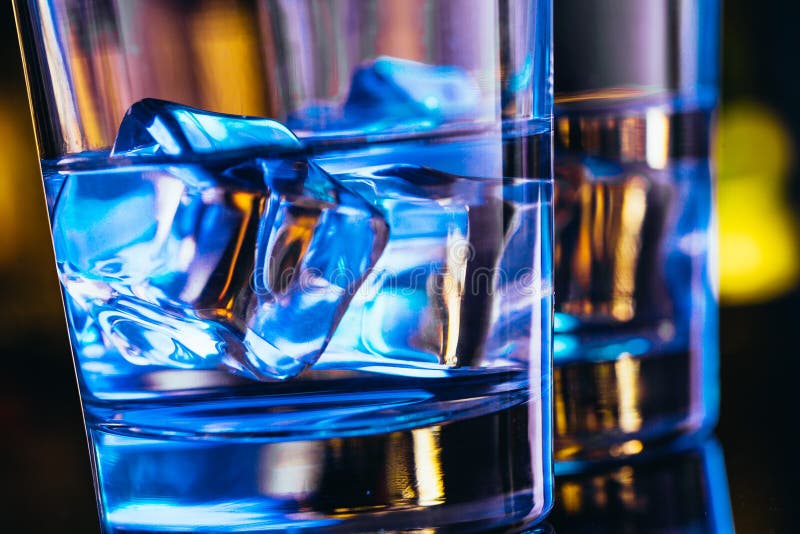 Two Glasses of Vodka with Ice Cubes Stock Photo - Image of cocktail ...
