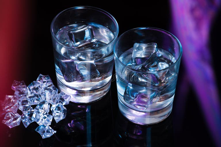 Two Glasses of Vodka with Ice Cubes Stock Photo - Image of cocktail ...