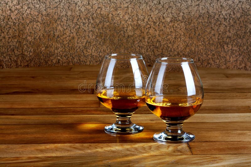 Two goblets of brandy stock image. Image of dark, elegance - 39604233