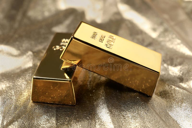 Two Gold Bars on Shiny Fabric, Closeup Stock Image - Image of ...