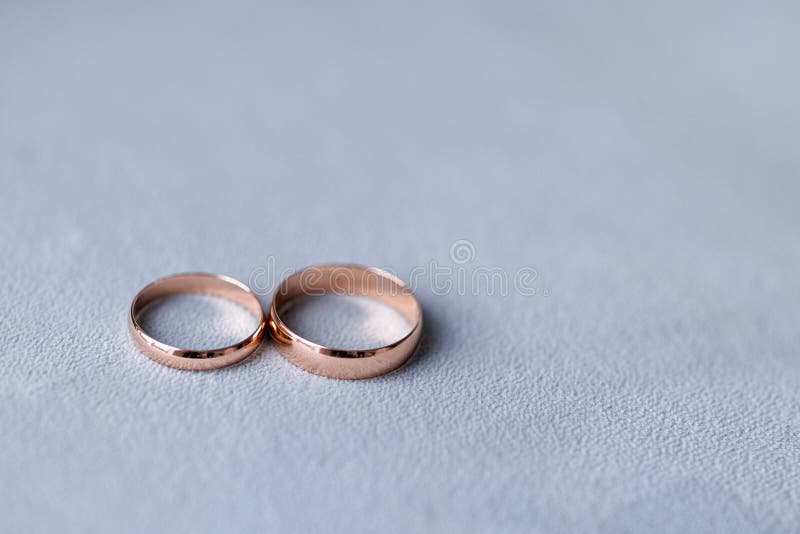 Two gold wedding rings stock photo. Image of outdoor - 276712438