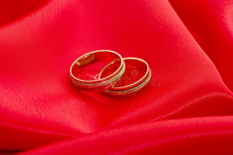 Two Gold Wedding Rings on the Red Stock Image - Image of luxury ...