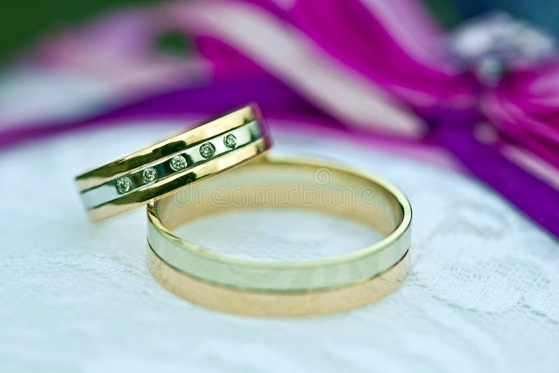 Two Gold Wedding Rings of White and Yellow Gold Stock Photo - Image of ...