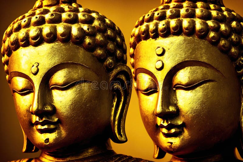 Two Golden Statues of Buddha, One Facing Forward and the Other Facing ...
