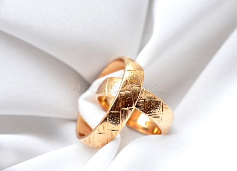 Two golden wedding rings stock photo. Image of white - 25303876
