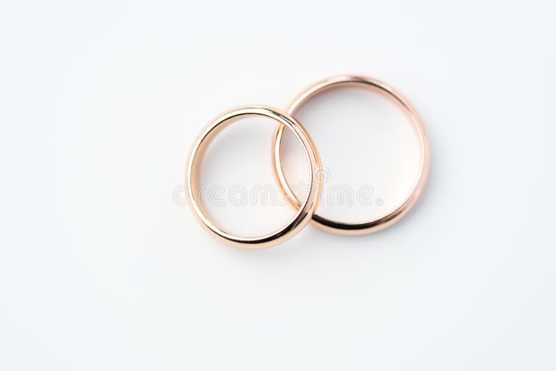 Two Golden Wedding Rings Isolated on White Stock Photo - Image of ...