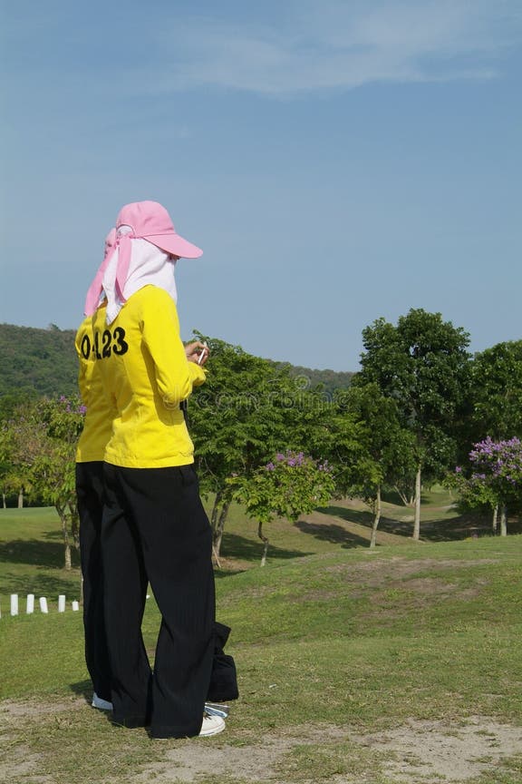 Two golf caddies talking stock image. Image of sport, assistant - 763799