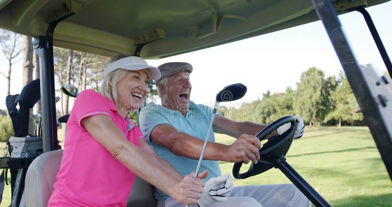 Two Golfers Driving in Their Golf Buggy Stock Footage - Video of golfer ...