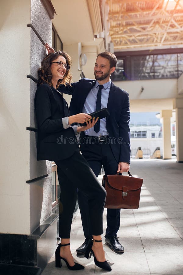 Two Good Looking Colleagues are Having Pleasant Conversation Stock ...
