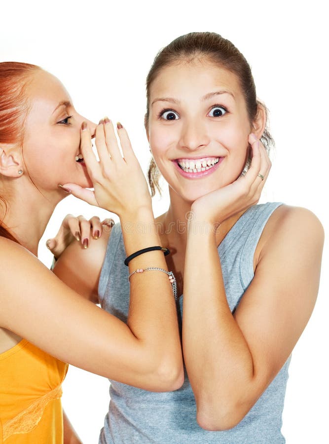 Two gossiping girls stock photo. Image of gossiper, couple - 11831580