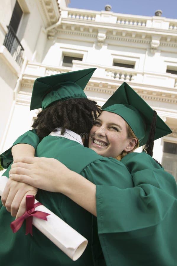 Two Graduates Hugging Outside Stock Photo - Image of happiness, closed ...