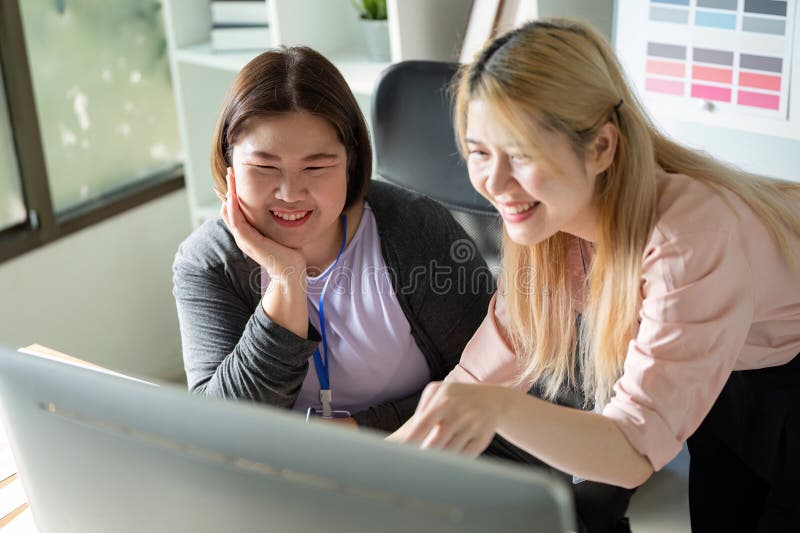 Joyful Graphic Design Team Sharing Ideas and Inspiration in a Creative ...