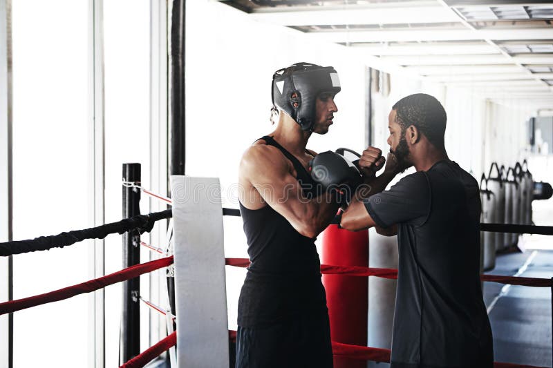 Two of the Greatest in One Ring. a Man Training in the Boxing Ring with ...