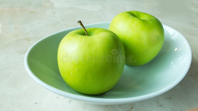 Two Green Apple with Shadow on White Bowl Stock Image - Image of ...