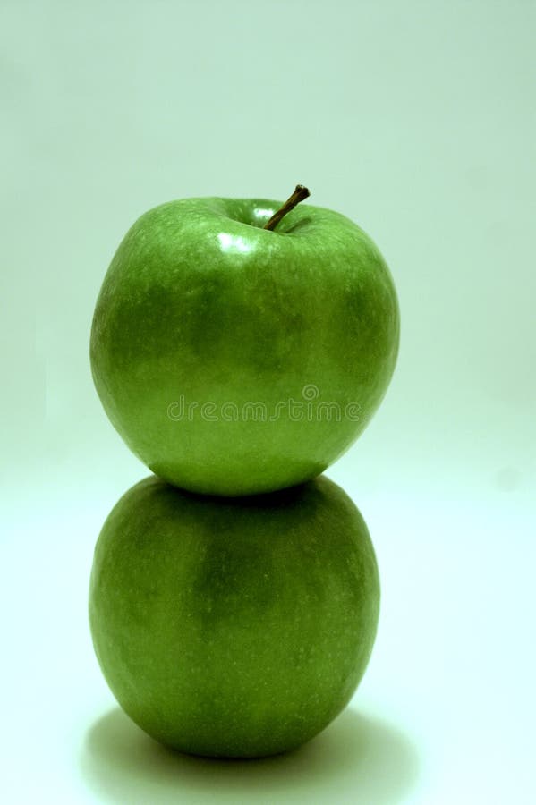 Two Green Apples Stacked stock photo. Image of lifestyle - 12848878