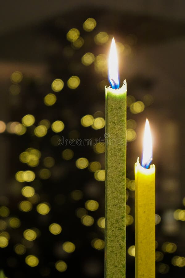 Two Green Candlesticks in Front of a Lit Christmas Tree Stock Image ...