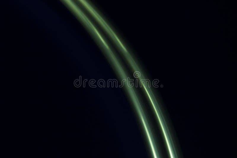 Two green light lines stock image. Image of dark, abstract - 161863583
