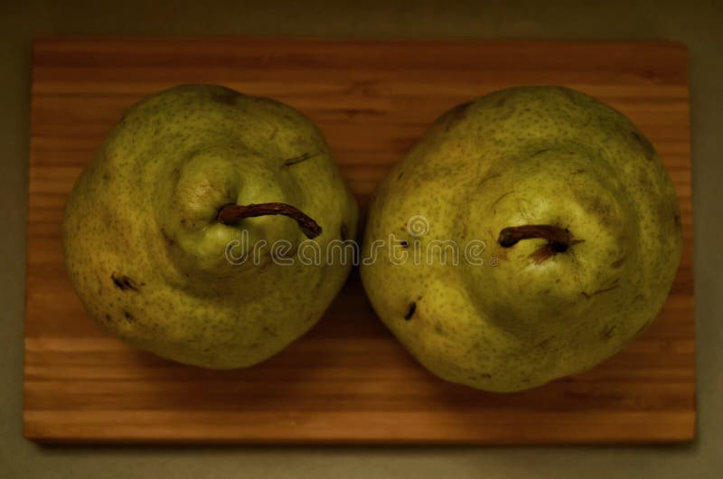 Two Green Pears on the Wood Stock Photo - Image of wood, pears: 192731722